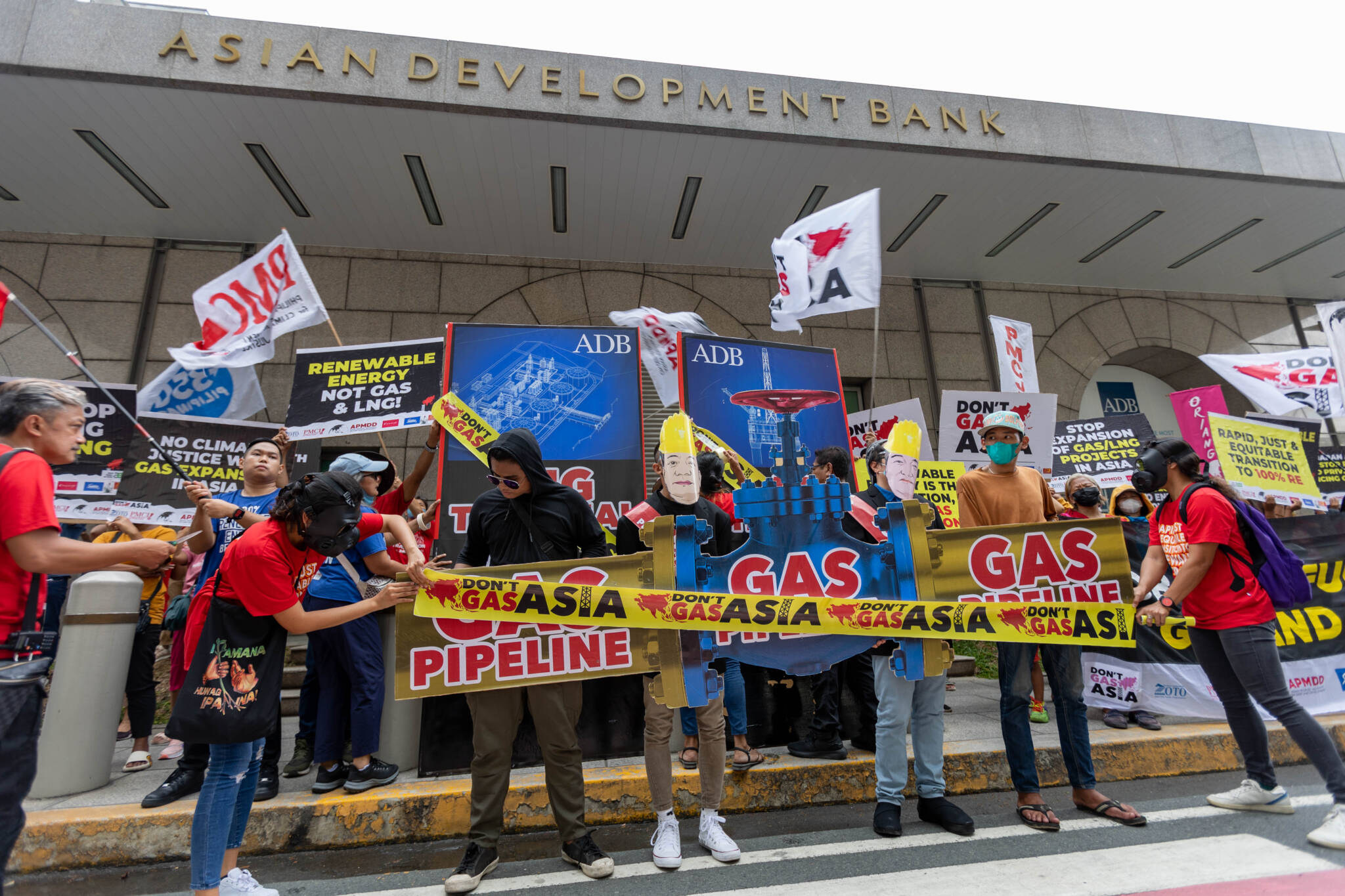 Climate advocates protest across Asia to call government and banks to ...